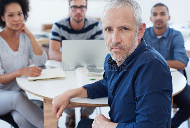 He Brings a Lot of Experience To the Team. Portrait of a Group of ...