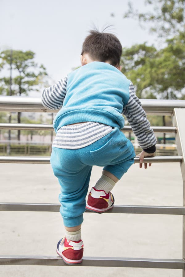 Brisk Child Climbing Railing Stock Image - Image of climbing, happy ...