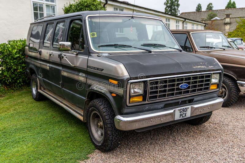 Bristol, UK- August 11, 2024: Front Side View of Black Ford Econoline ...