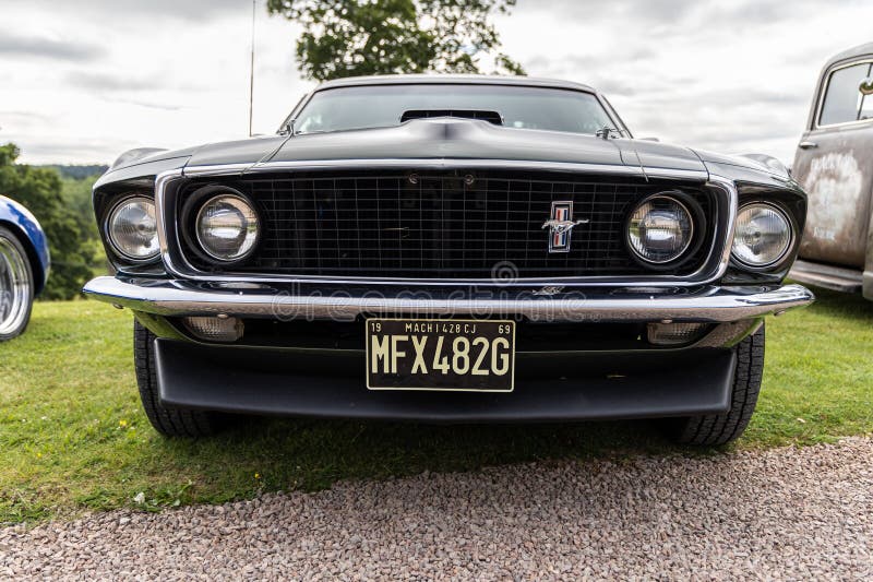 Bristol, UK- August 11, 2024: Front View of Dark Green Ford Mustang ...