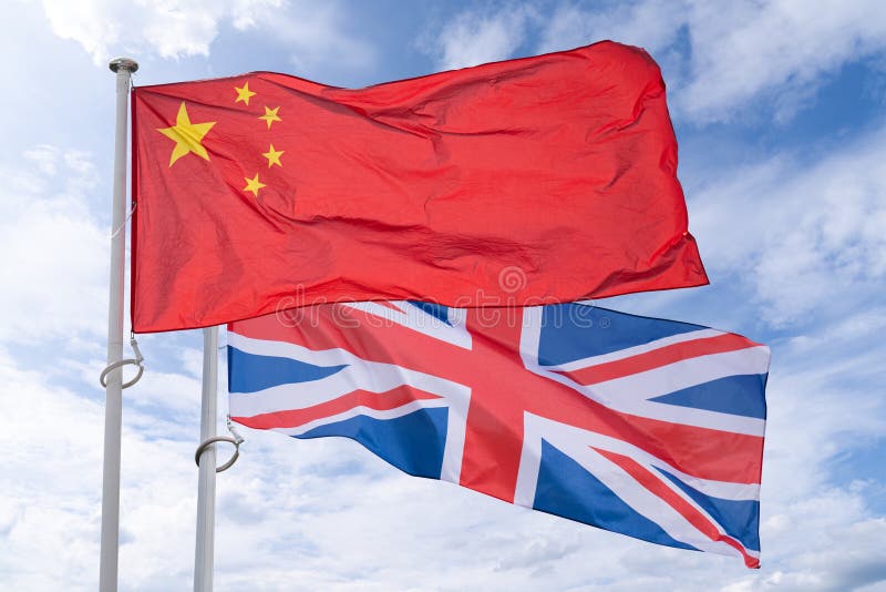 British and Chinese Flags Flutter in the Wind. Stock Photo - Image of ...