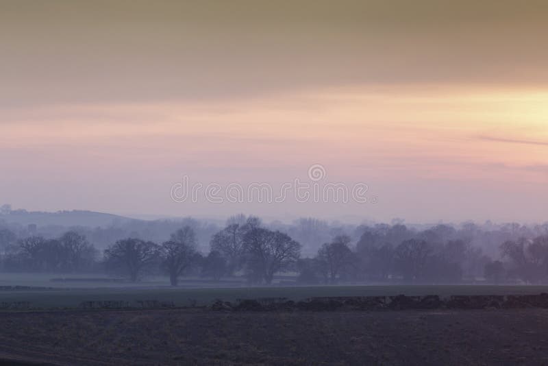 British Countryside Fields at Hazy Sunset Stock Image - Image of ...