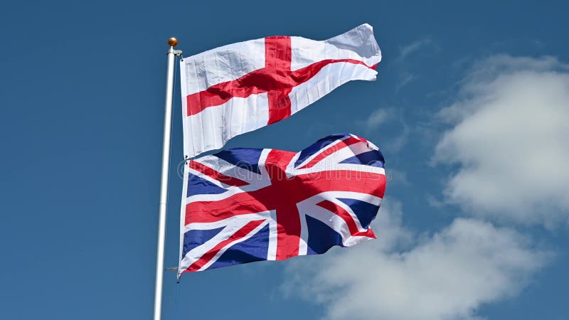British and English Flags on Blue Sky Background. Stock Footage - Video ...