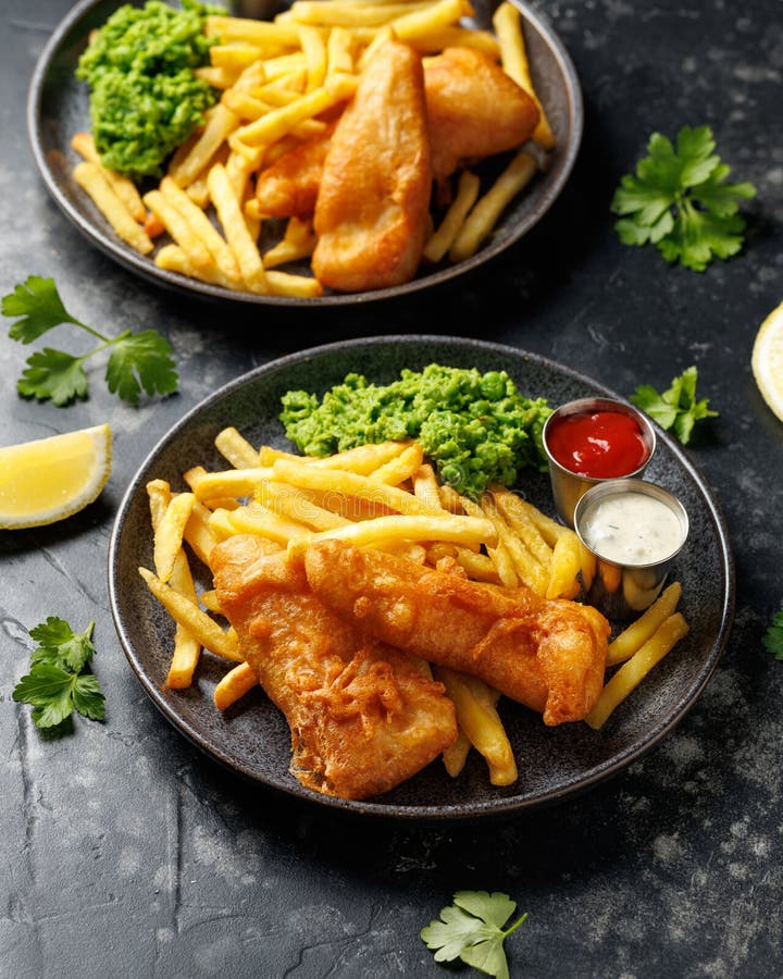 British Fish and Chips with Mashed Peas, Tartar and Ketchup Sauce ...