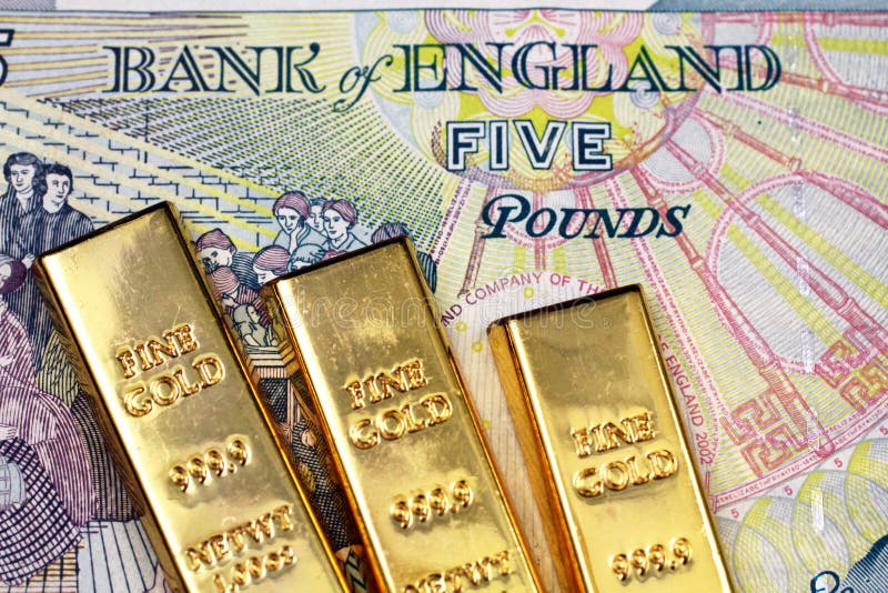 A British Five Pound Note with Three Small Gold Bars Editorial ...