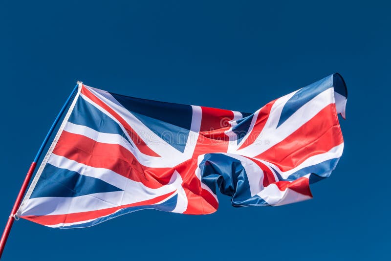 British Flag on blue sky stock photo. Image of blue, culture - 79339340