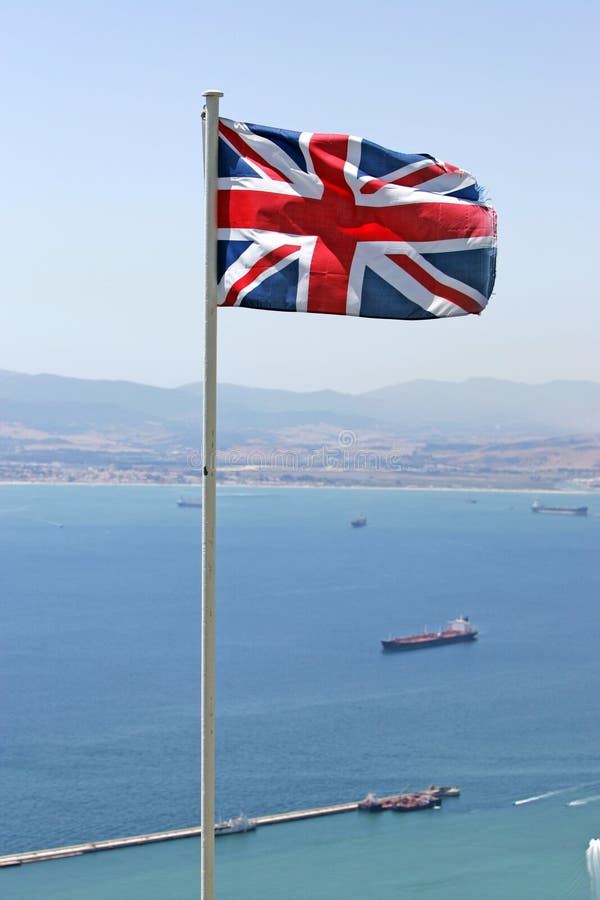 British Flag Flying on Top of the Rock of Gibraltar Stock Image - Image ...