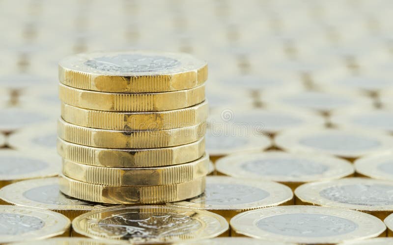 British Money, New Pound Coins in a Neat Stack. Stock Image - Image of ...