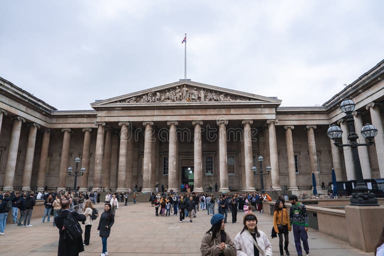 The British Museum Facade with Ionic Columns and Union Jack Flag ...
