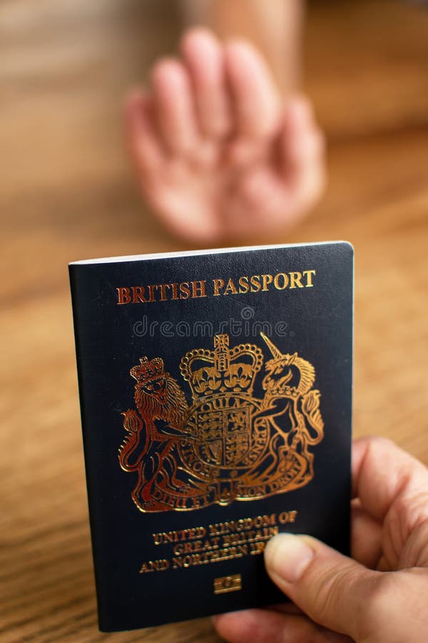 British Passport Being Rejected With A Hand Raised Barring Entry Stock