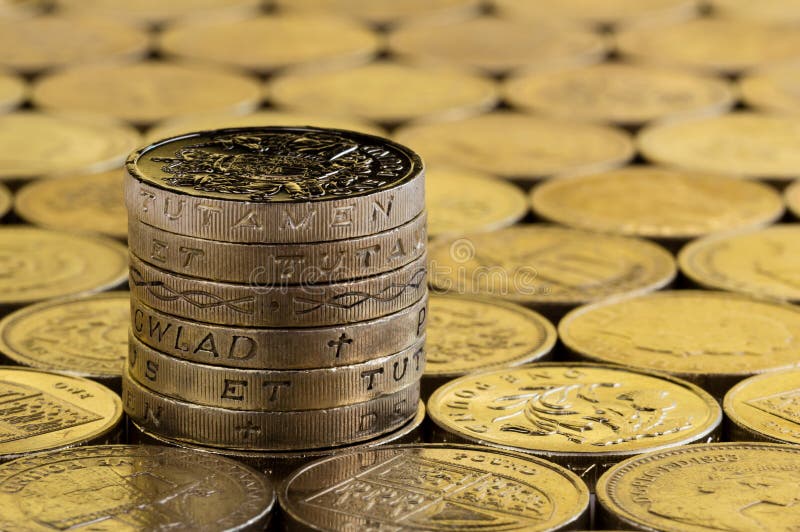 British Money, New Pound Coins in Three Stacks. Stock Image - Image of ...