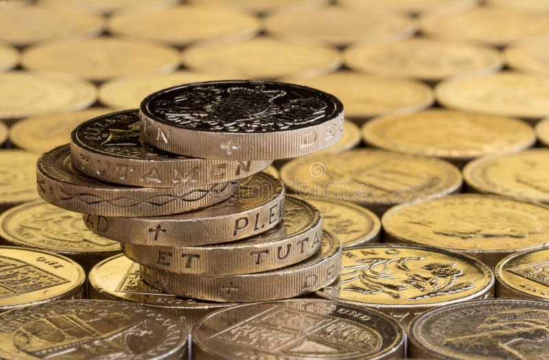 British Money, New Pound Coins in a Neat Stack. Stock Image - Image of ...
