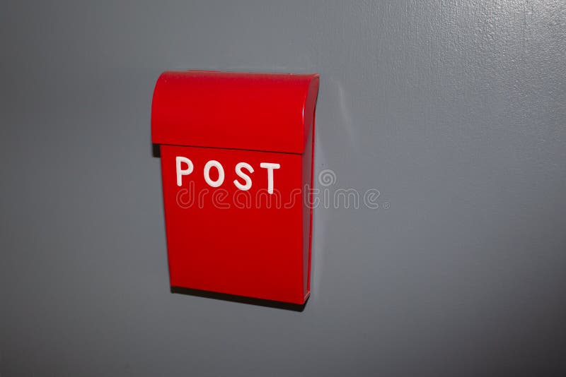 British Red Post Box on Grey Wall Background Stock Photo - Image of ...