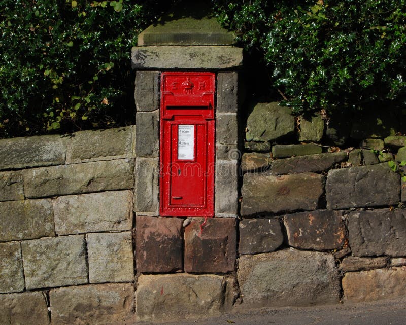 British Red Post Box on Wall Stock Image - Image of mail, holly: 11441715