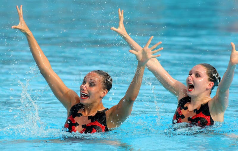 Synchronized Swimmers stock photo. Image of purl, hands - 11838916