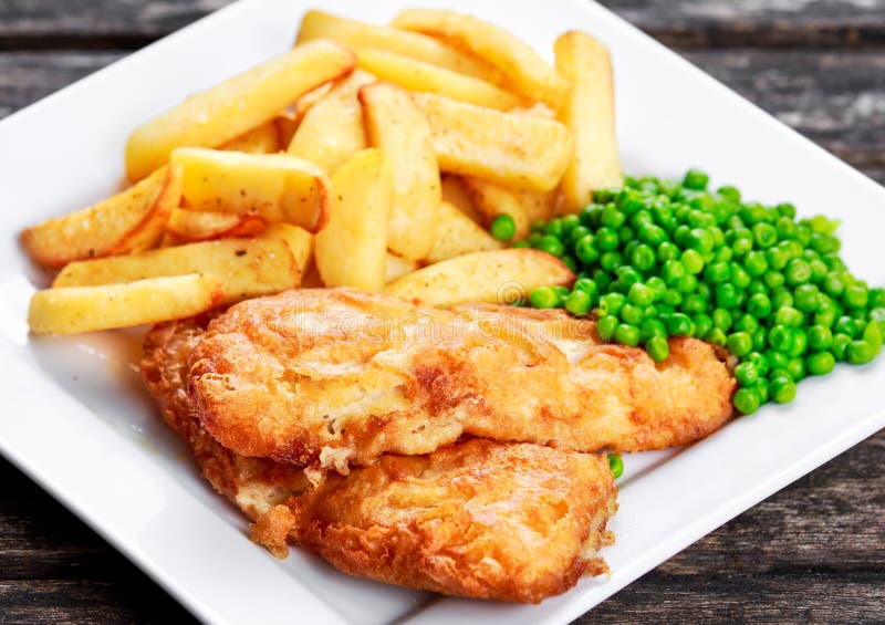 British Traditional Fish and Chips with Mashed Peas, Tartar Sauce and ...