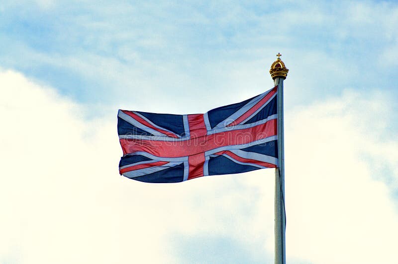 The British Flag Flying In The Blue Sky. Stock Photo - Image of trees ...
