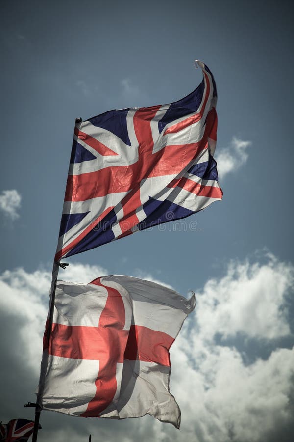 British Union Jack Flag Blowing in the Wind. Stock Photo - Image of ...