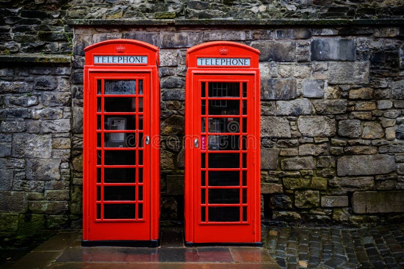2 rode telefooncellen stock foto. Image of bestrating - 34250186