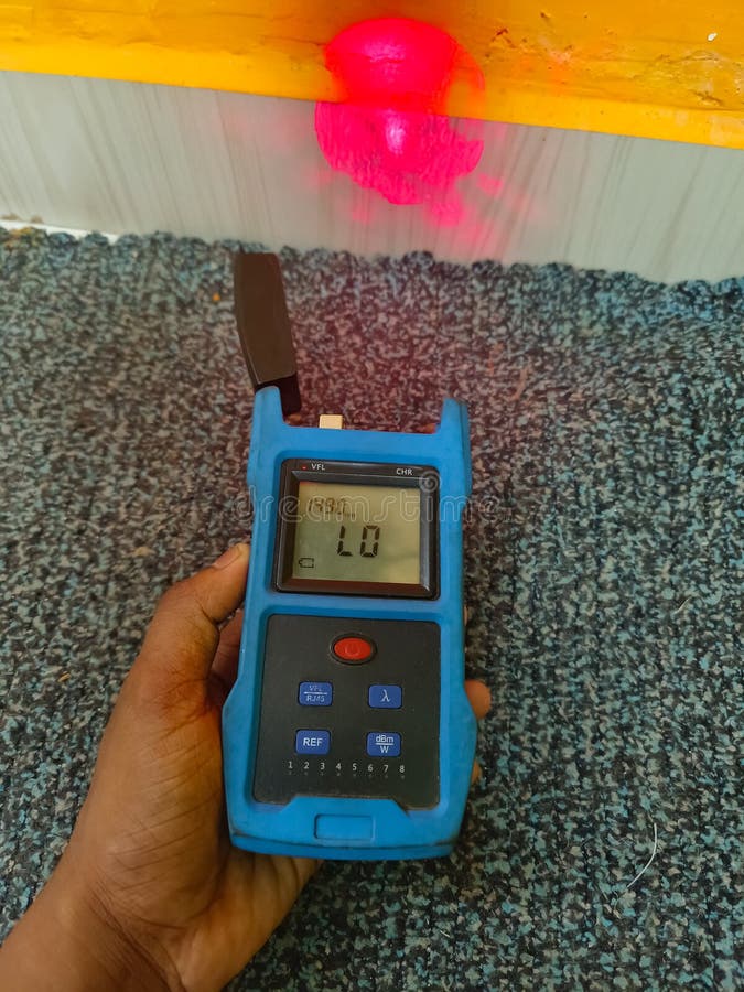 Broadband Service Technicians Having Optical Power Meter with with ...