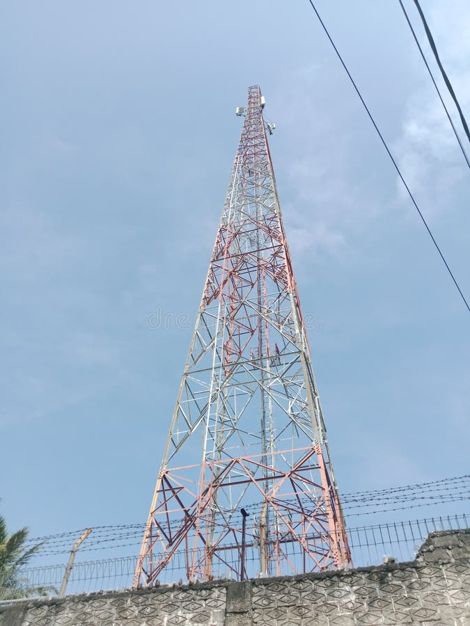 Broadcast Tower Standing Tall in Blue Sky Stock Image - Image of ...