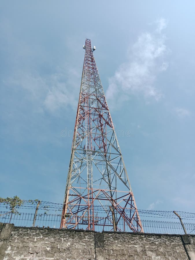 Broadcast Tower Standing Tall in Blue Sky Stock Image - Image of ...