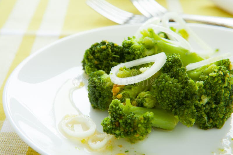 Broccoli Cooked in the Oven on a White Dish Stock Photo - Image of ...