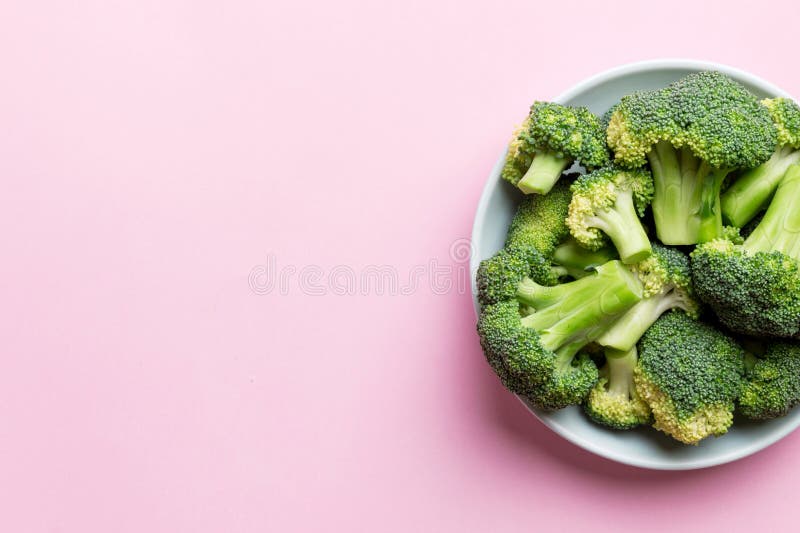 Broccoli of Fresh Green Broccoli in Bowl Over Coloredbackground ...