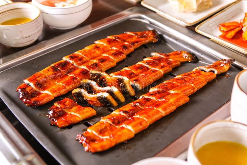 Broiled Eels on Table in Restaurant Stock Photo - Image of japan, grill ...