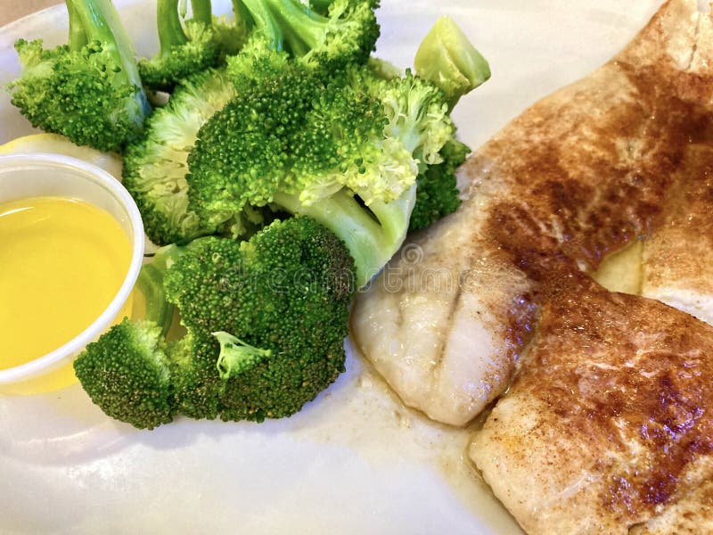 Broiled Fish with Broccoli stock photo. Image of food - 254169472