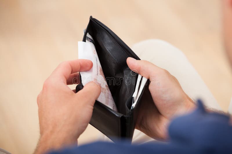 Broke Man Holding Wallet stock image. Image of money - 56903681