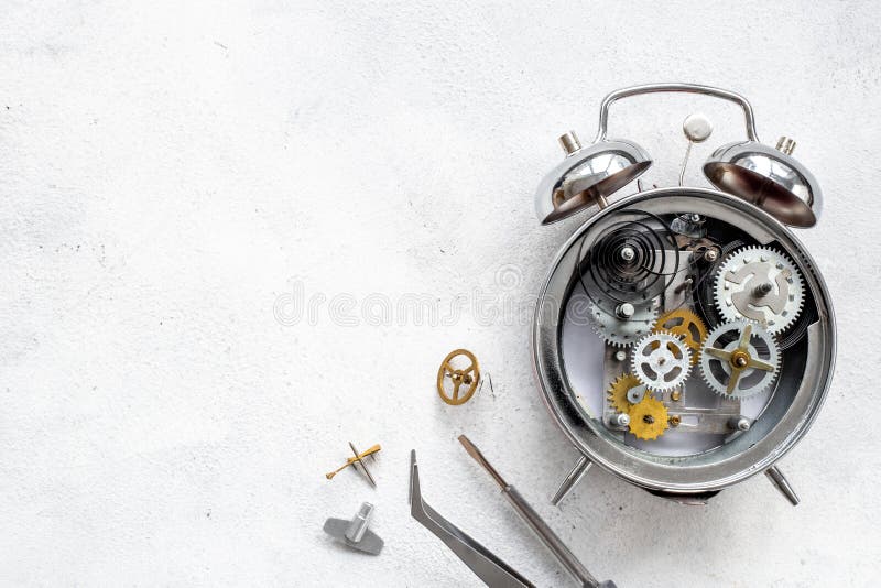 Broken Alarm Clock Top View. Watch Mechanism and Watchmaker Tools Stock ...