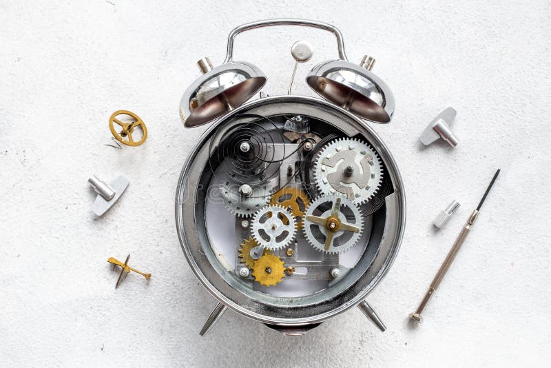 Broken Alarm Clock Top View. Watch Mechanism and Watchmaker Tools Stock ...