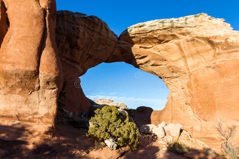 Broken Arch in Arches NP stock photo. Image of hiking - 140850570