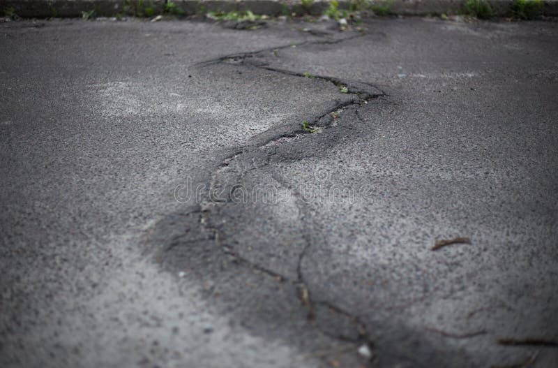 Broken Asphalt and Cracks on the Road Surface Stock Photo - Image of ...