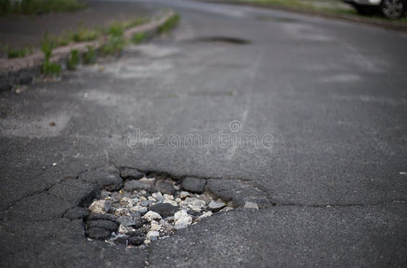 Broken Asphalt and Cracks on the Road Surface Stock Photo - Image of ...