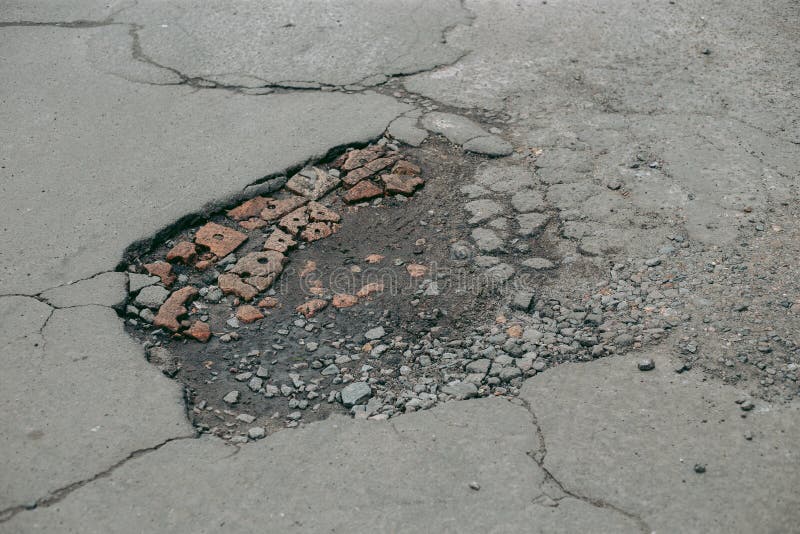 Broken Asphalt and Cracks on the Road Surface Stock Image - Image of ...