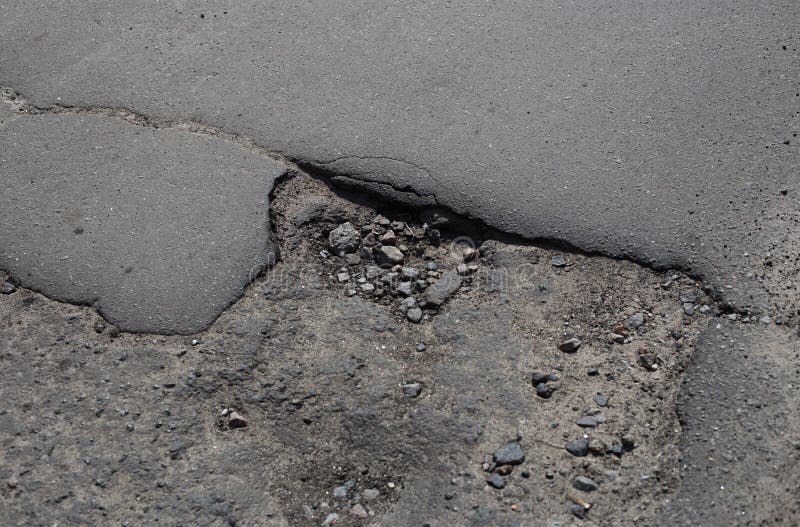 Broken Asphalt and Cracks on the Road Surface Stock Photo - Image of ...