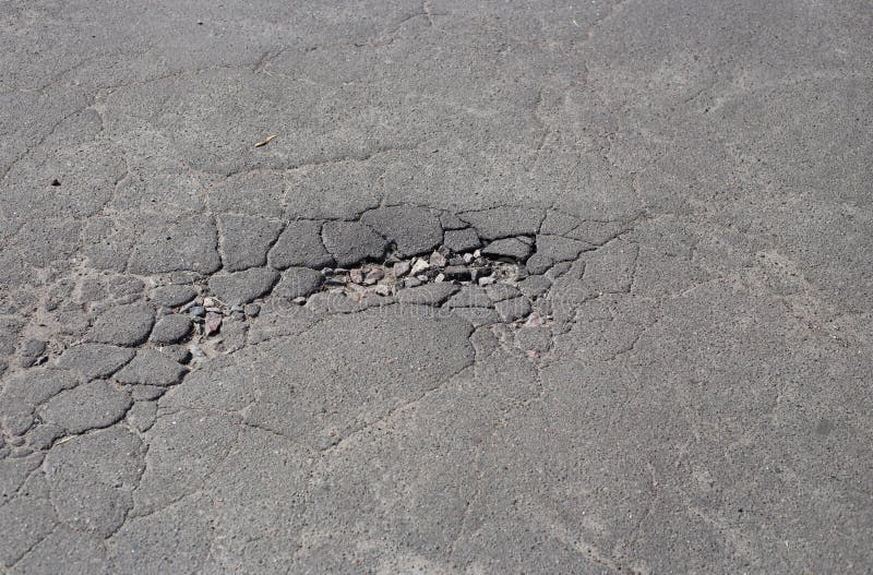 Broken Asphalt and Cracks on the Road Surface Stock Photo - Image of ...