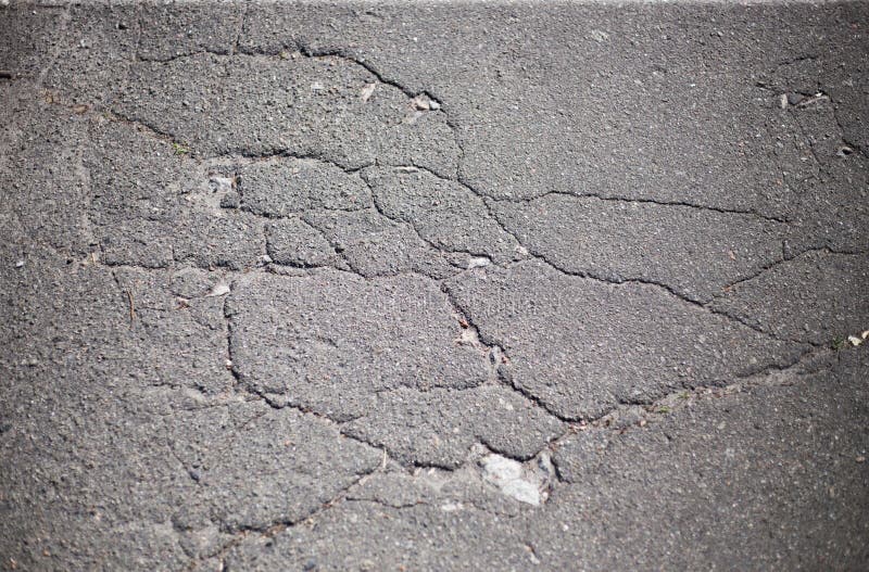 Broken Asphalt and Cracks on the Road Surface Stock Photo - Image of ...