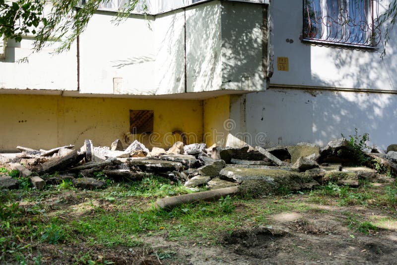 Broken Asphalt Pavement. Broken Blind Area of an Apartment Building ...