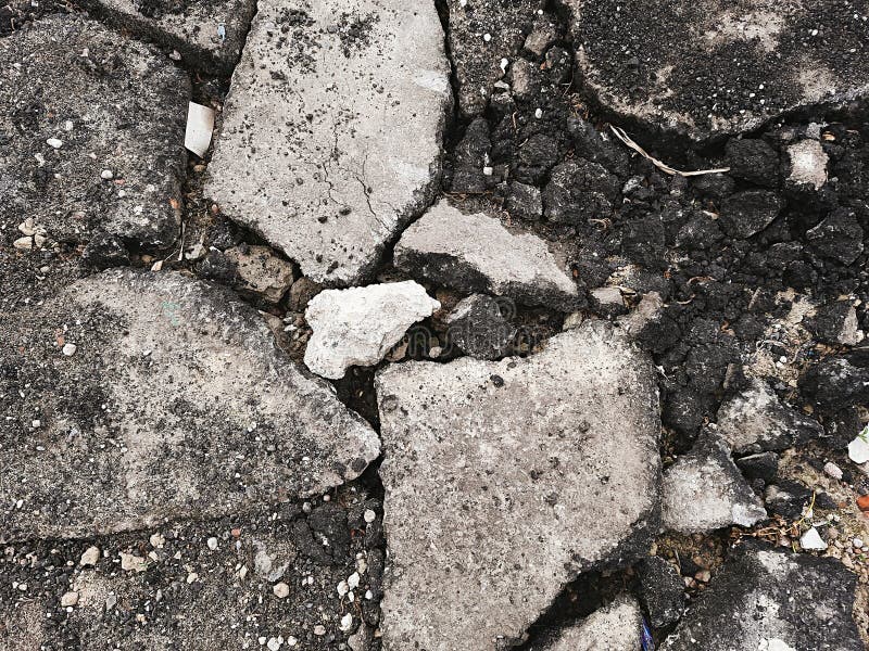 Broken asphalt pavement stock photo. Image of outdoor - 250850352