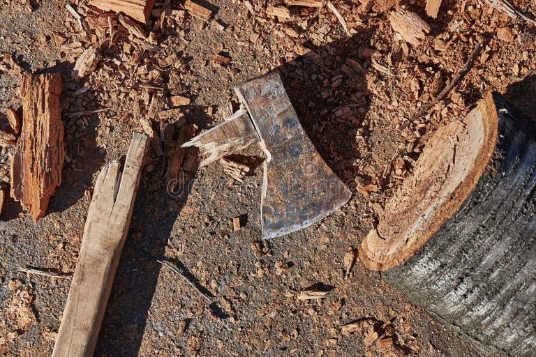 Broken Axe on the Ground by the Wood Stack Stock Photo - Image of ...