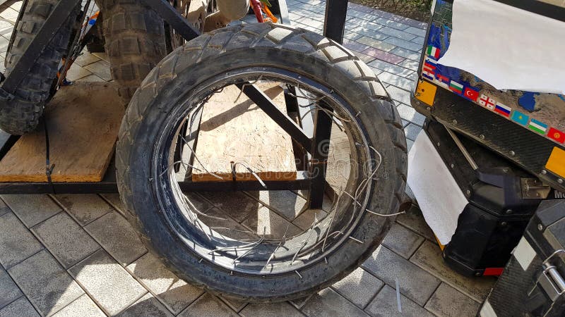 Broken Back Motorcycle Wheel with Broken Wire Spokes Stock Image ...