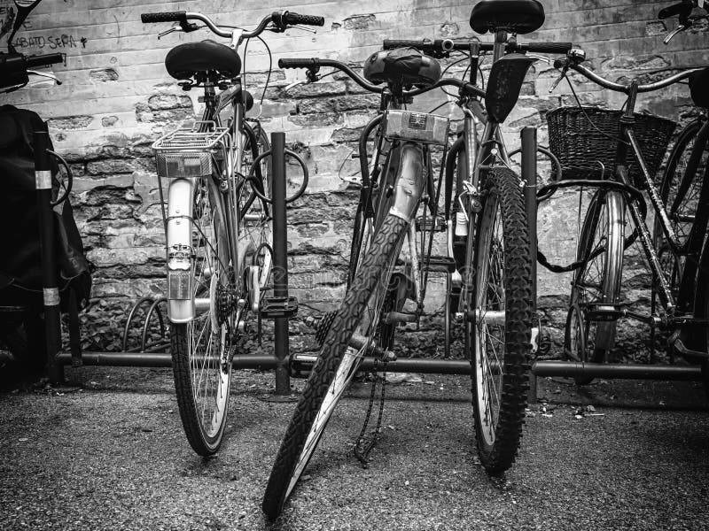 Broken Bicycle Abandoned in a Bike Rack Stock Photo - Image of group ...