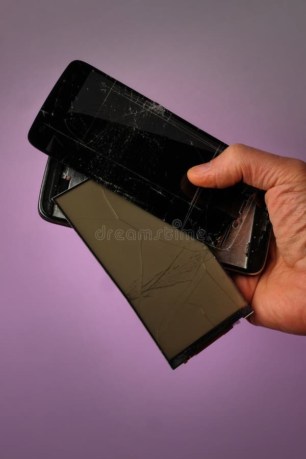 Broken Mobile Phone With Cracked Display In Hand Stock Photo - Image of ...