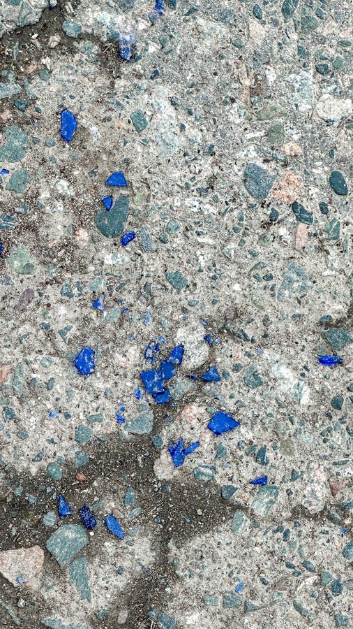 Broken Blue Glass on the Concrete. the Glass is Shattered and Scattered ...