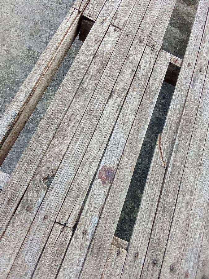 Broken board with holes stock image. Image of roof, walkway - 364998963