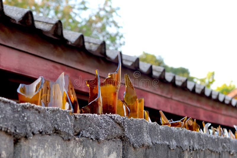 Broken Bottle Glass Fence in Thailand Stock Photo - Image of white ...