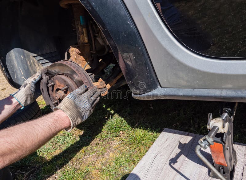 Broken Brake Change in a Car Stock Image - Image of service, spring ...